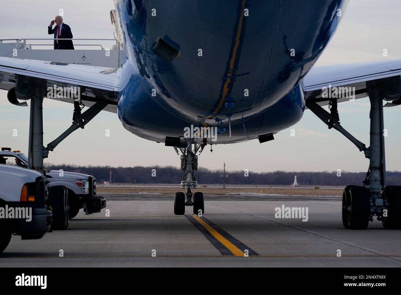 President Joe Biden salutes before boarding Air Force One at Truax ...