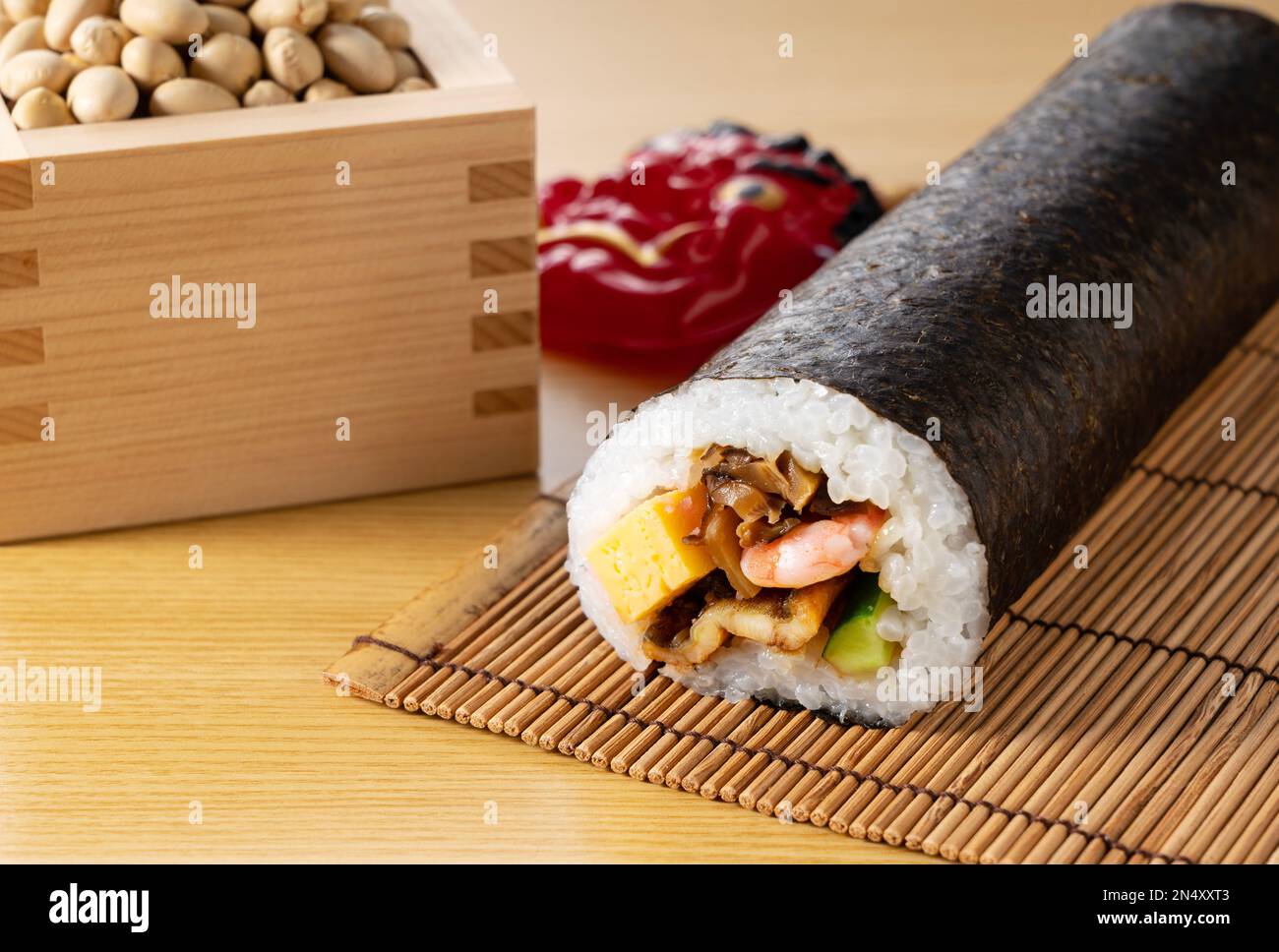 Eho-maki rolls, beans for mame-maki (bean-throwing), and demon masks on ...