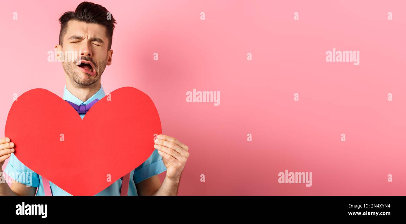 Valentines day concept. Sad and lonely man feeling heartbroken, being ...