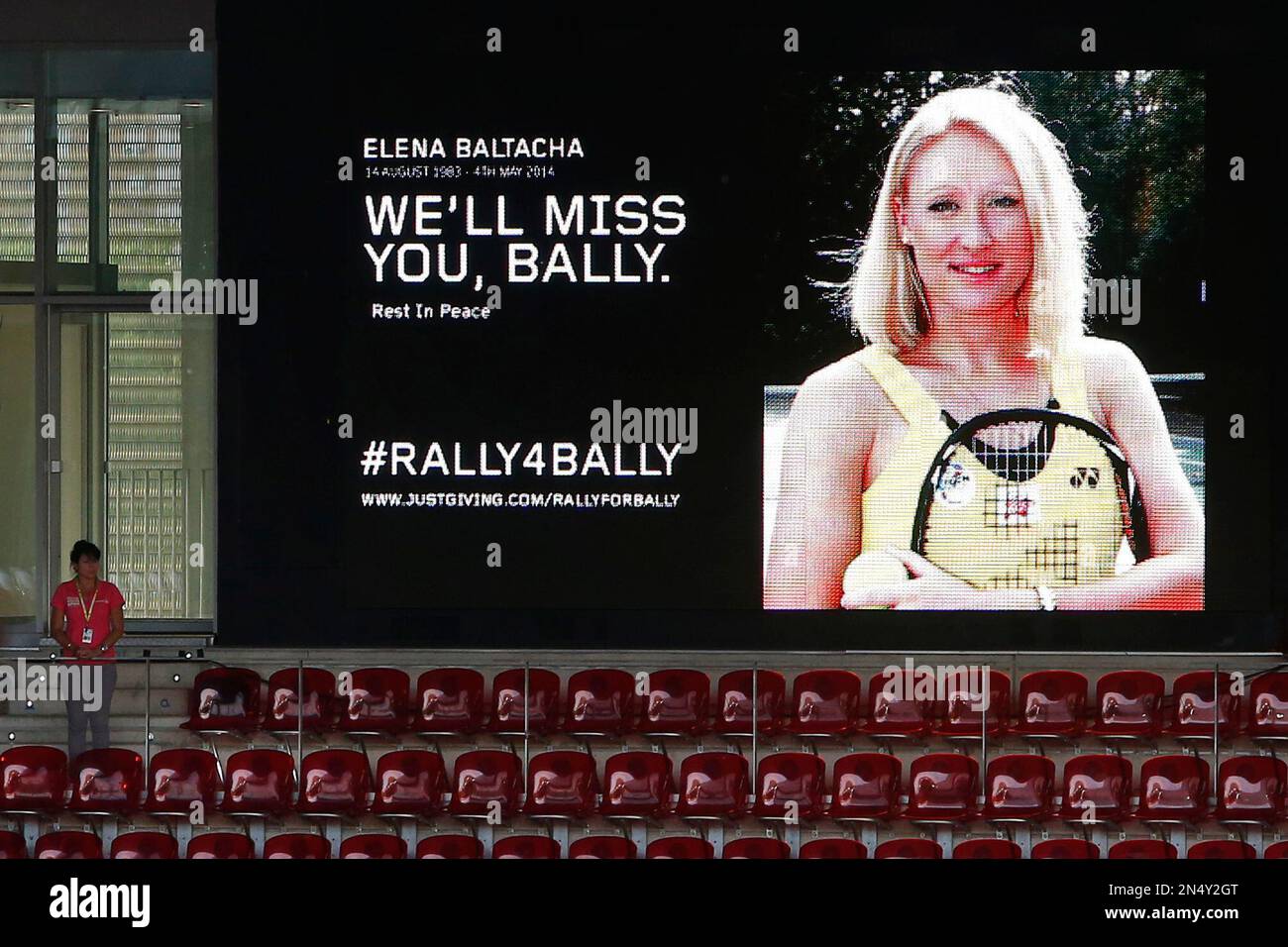 An image of Elena Baltacha is displayed in the stadium as people stand ...