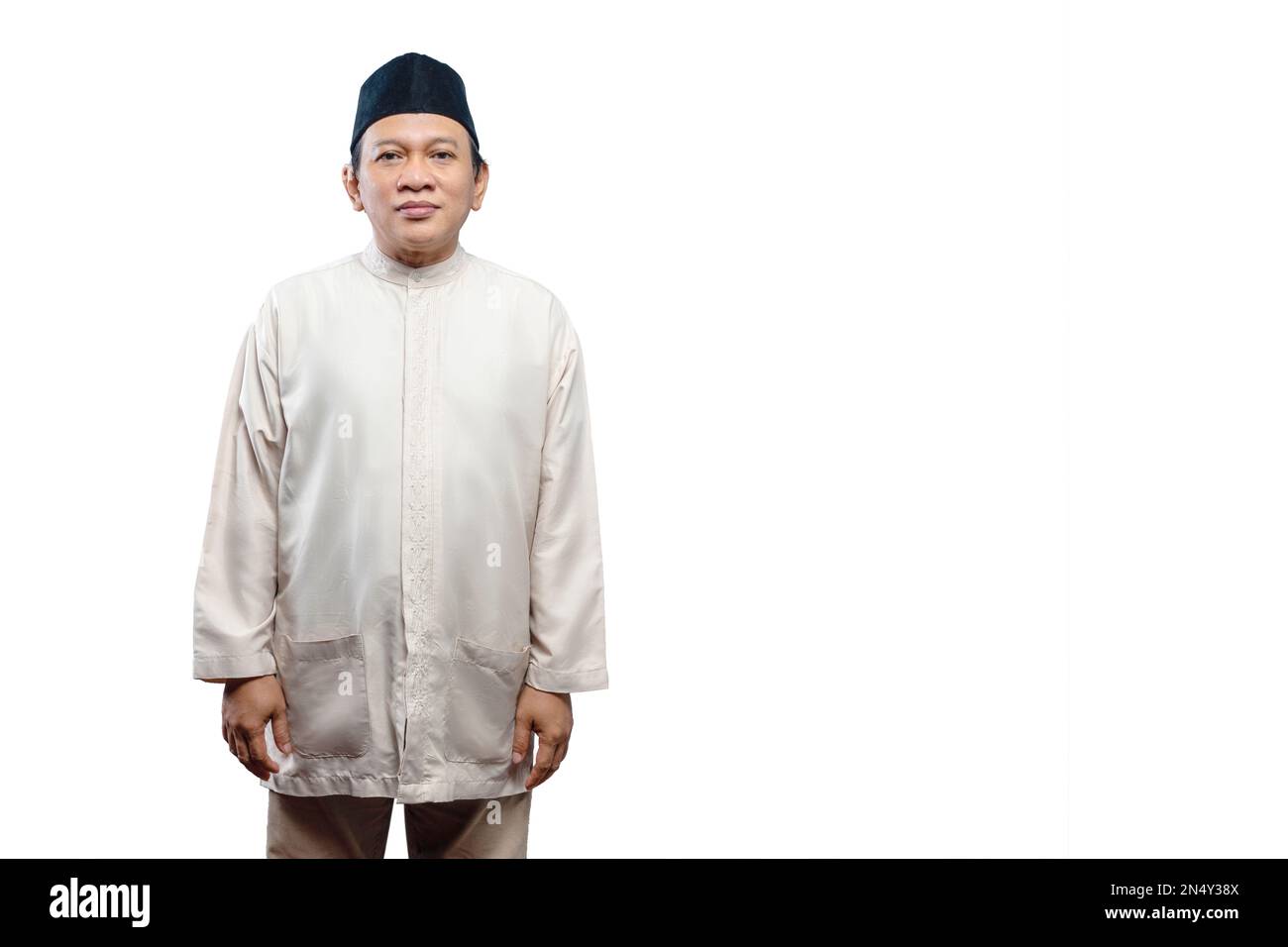 Portrait happy islamic man standing Cut Out Stock Images & Pictures - Alamy