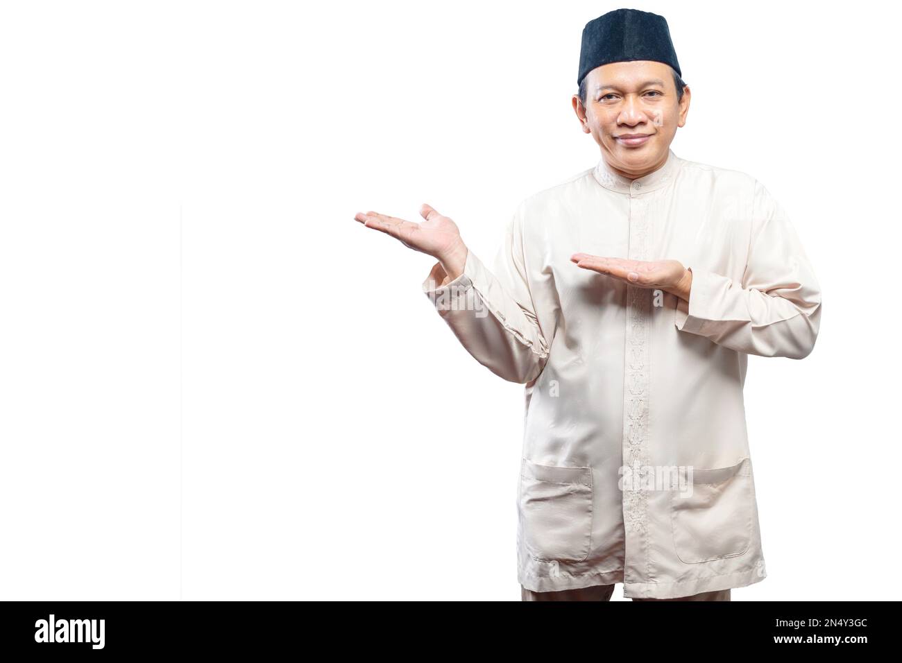 Asian Muslim man with open palm hand showing something isolated over ...