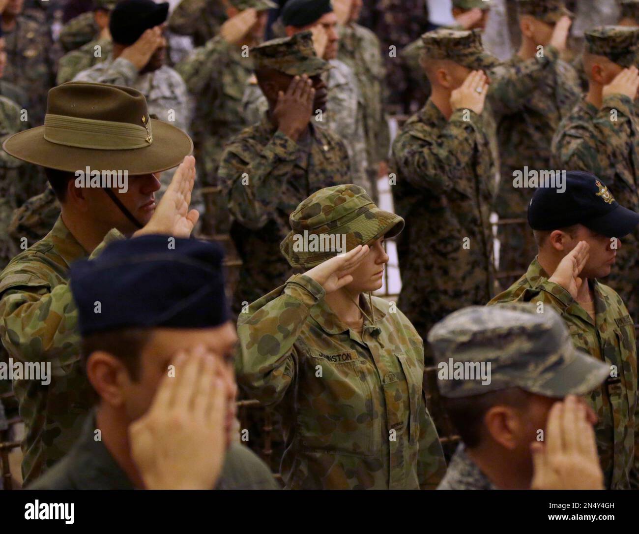 Australian military officers salute together with US and Philippine ...