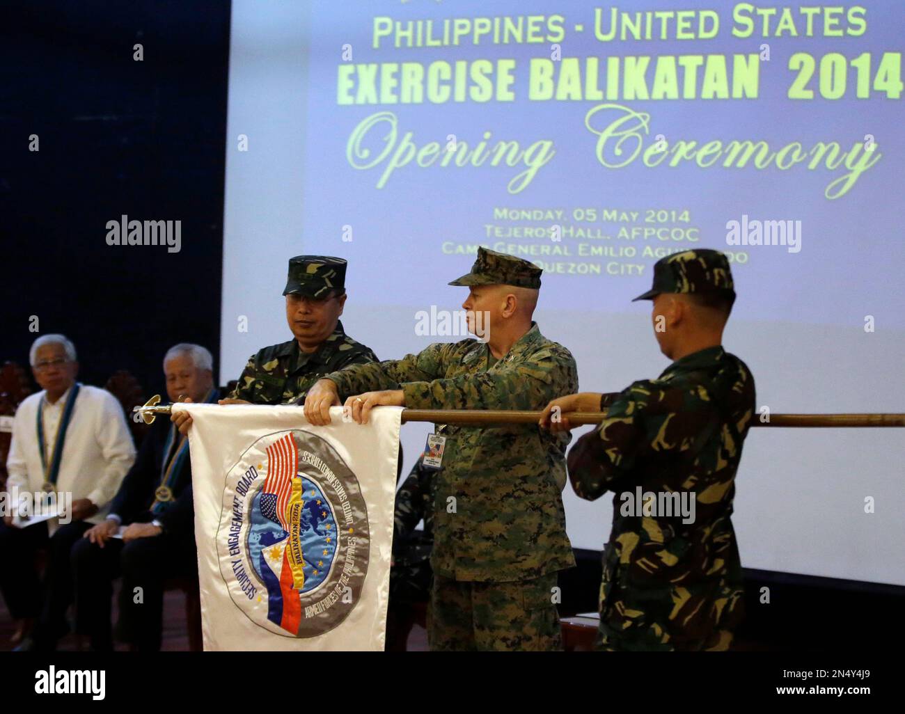 U.S. Marine Col. John A. Rutherford, second from right, and Philippine ...