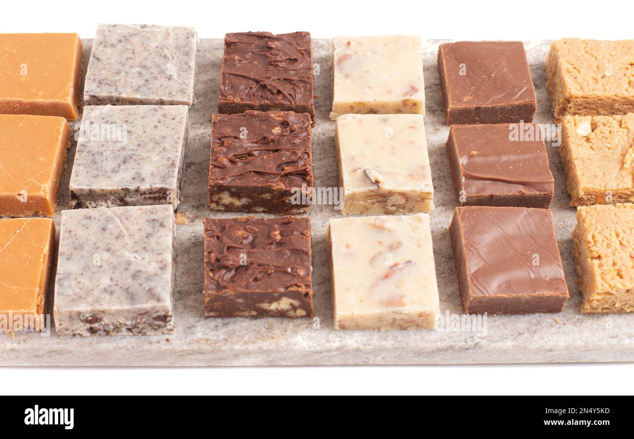 An Assortment of Various Flavors of Fudge on a White Background Stock ...