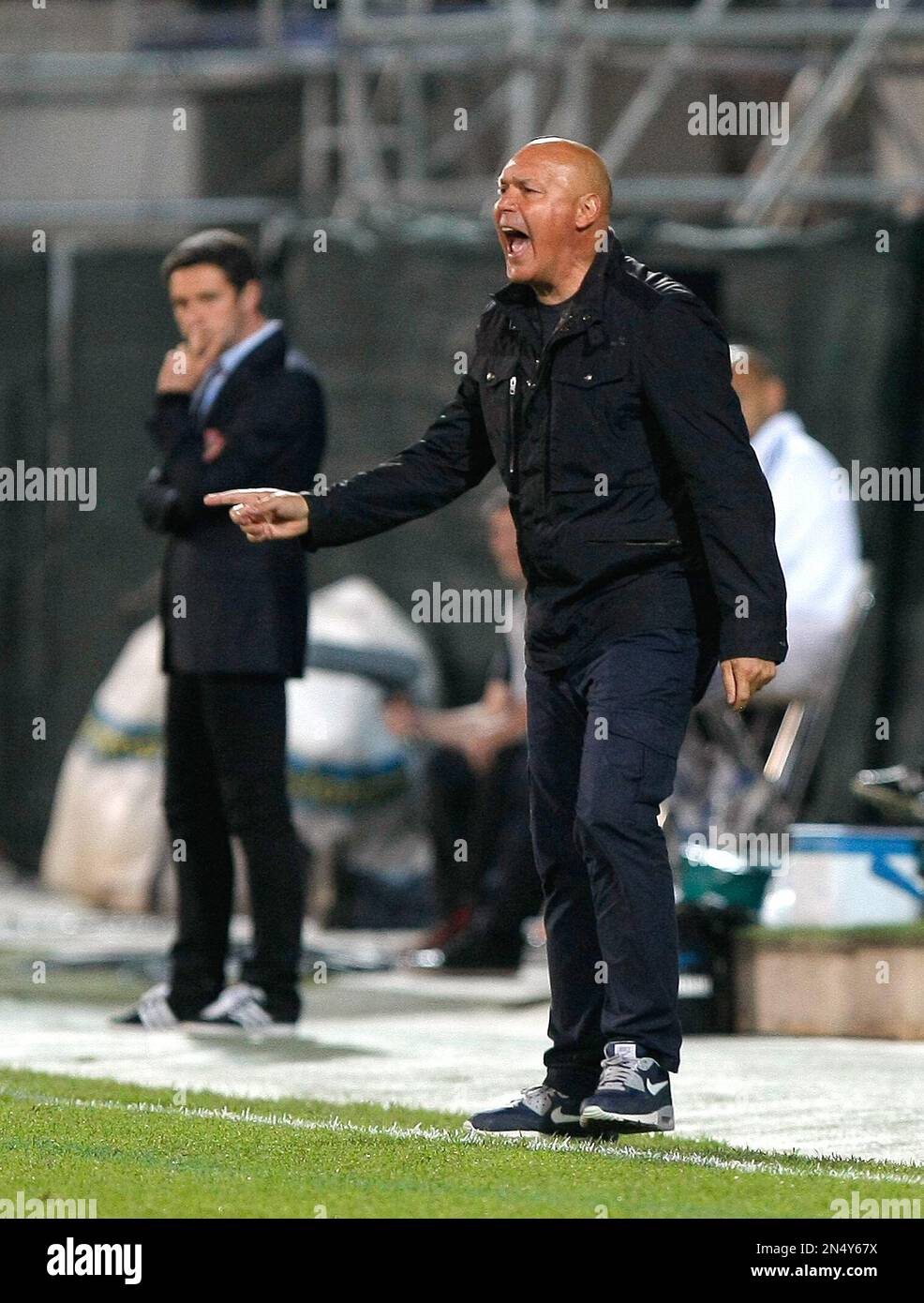 Marseille's French coach Jose Anigo shouts instructions during their ...