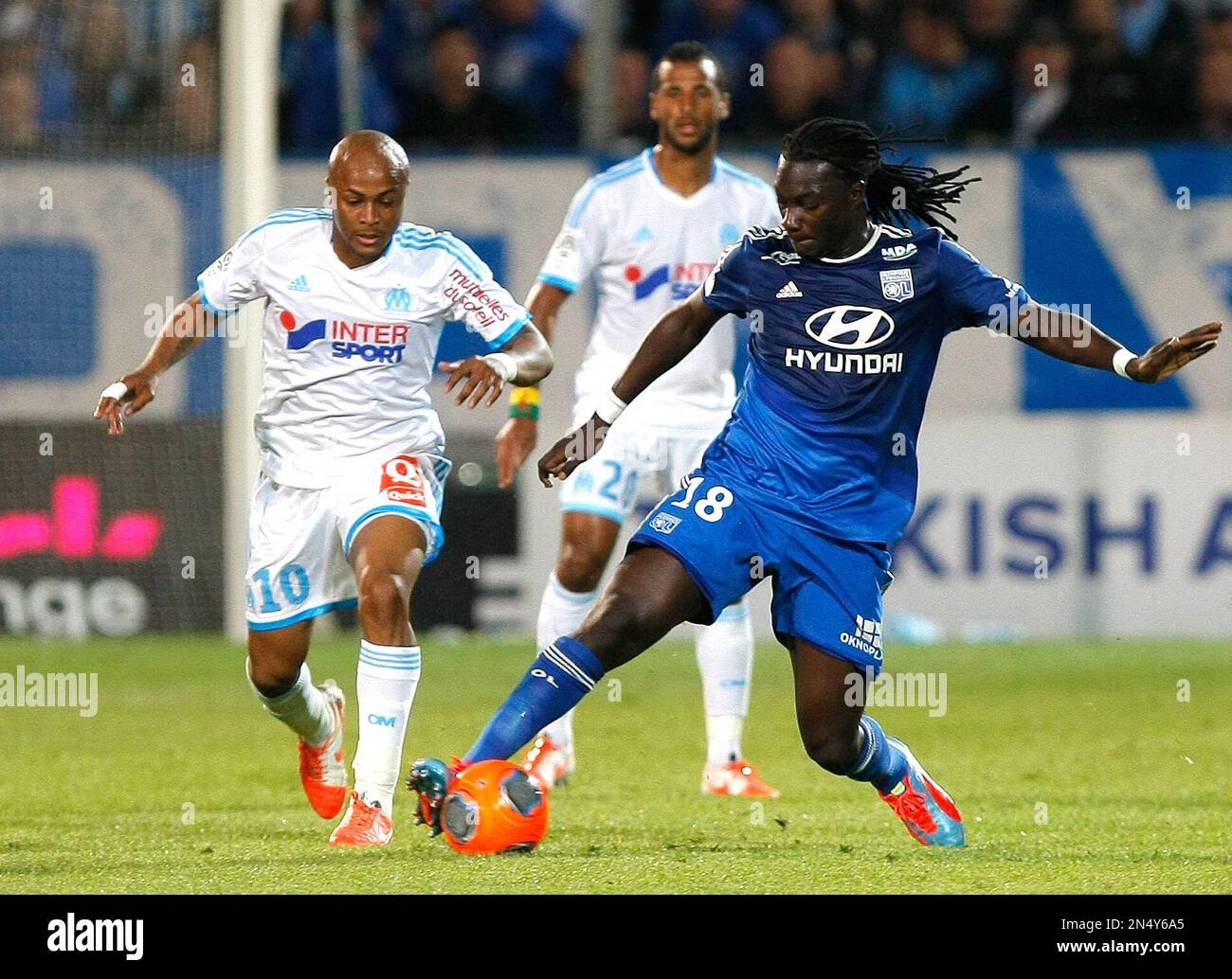Lyon's French forward Gomis Bafetimbi, right, challenges Marseille's ...