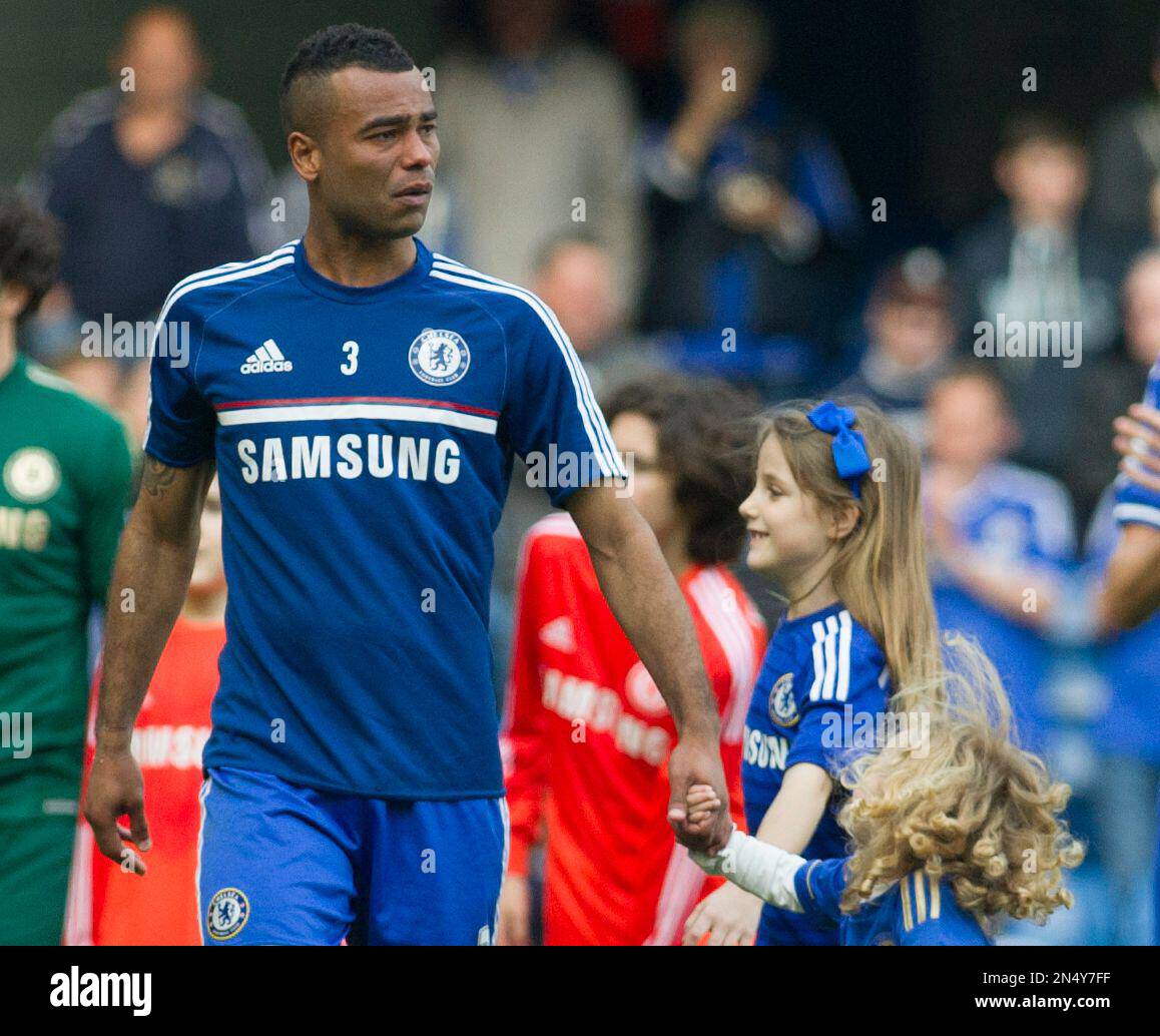 Chelsea's Ashley Cole, walks around the pitch with his children at the ...