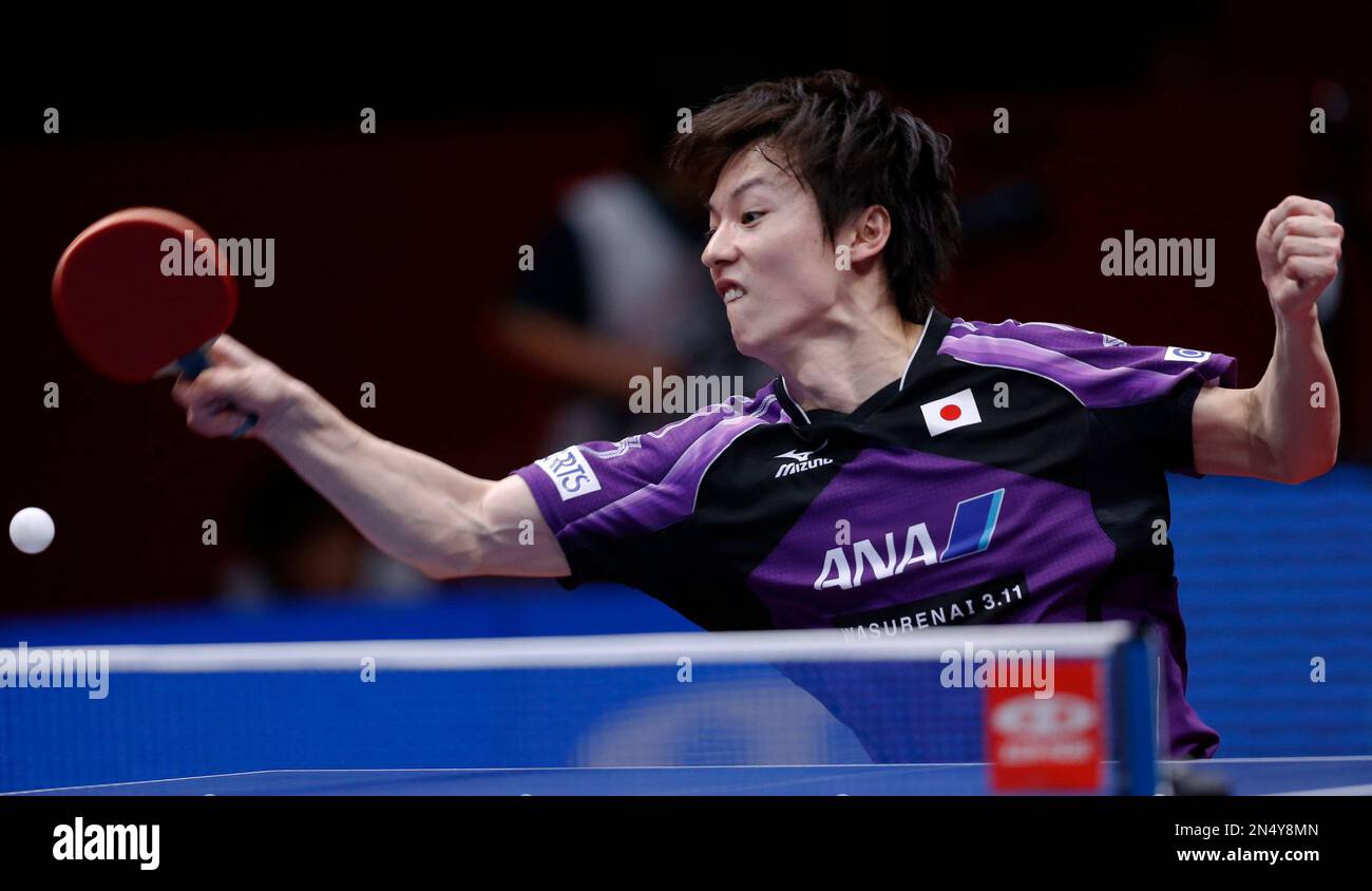 Kenta Matsudaira of Japan returns a shot to Patrick Franziska of ...