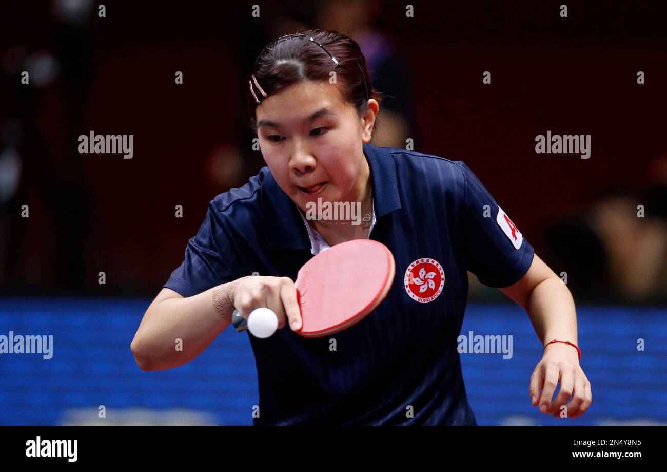 Lee Ho Ching of Hong Kong returns a shot to Yuka Ishigaki of Japan ...