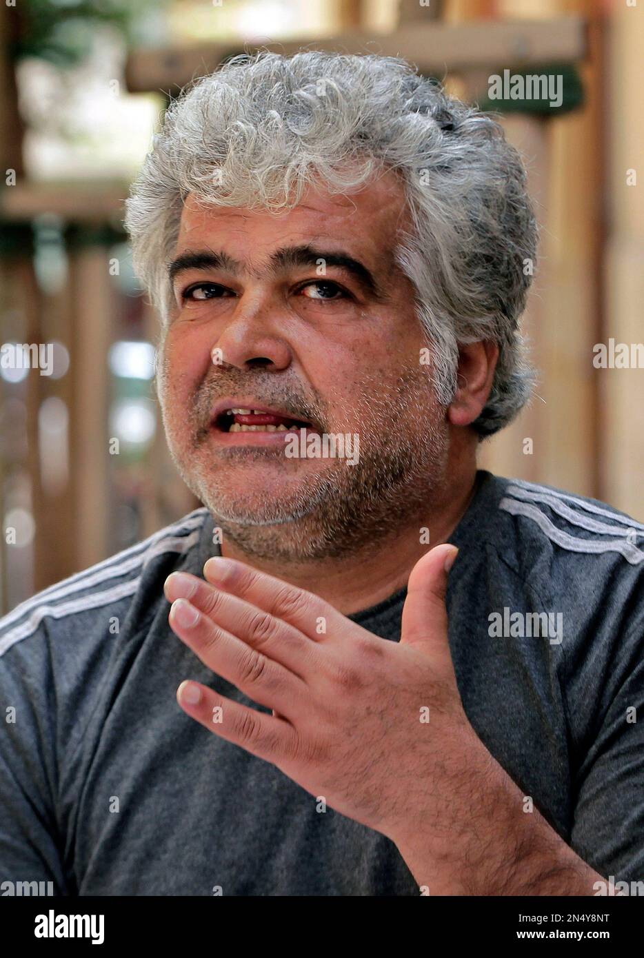 In this Monday, April 21, 2014 photo, Syrian novelist Khaled Khalifa ...