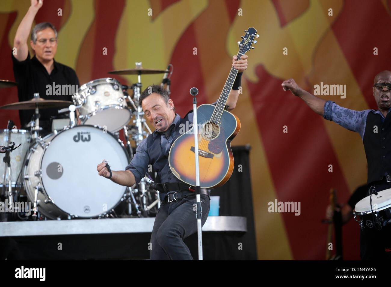 Bruce Springsteen performs with drummer Max Weinstein, above, at the ...