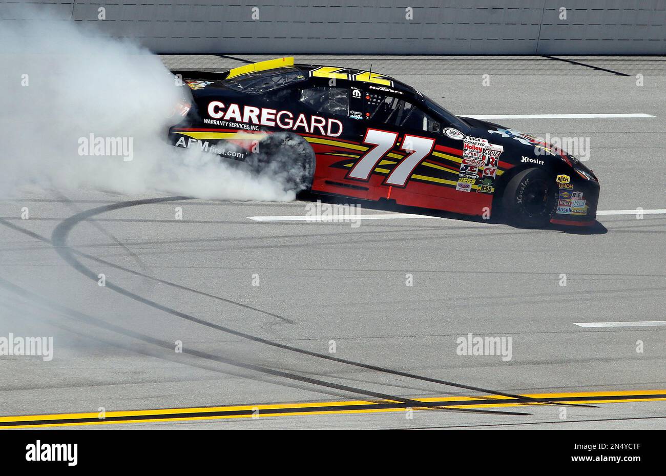 Driver Tom Hessert celebrates after winning the ARCA Racing Series auto ...