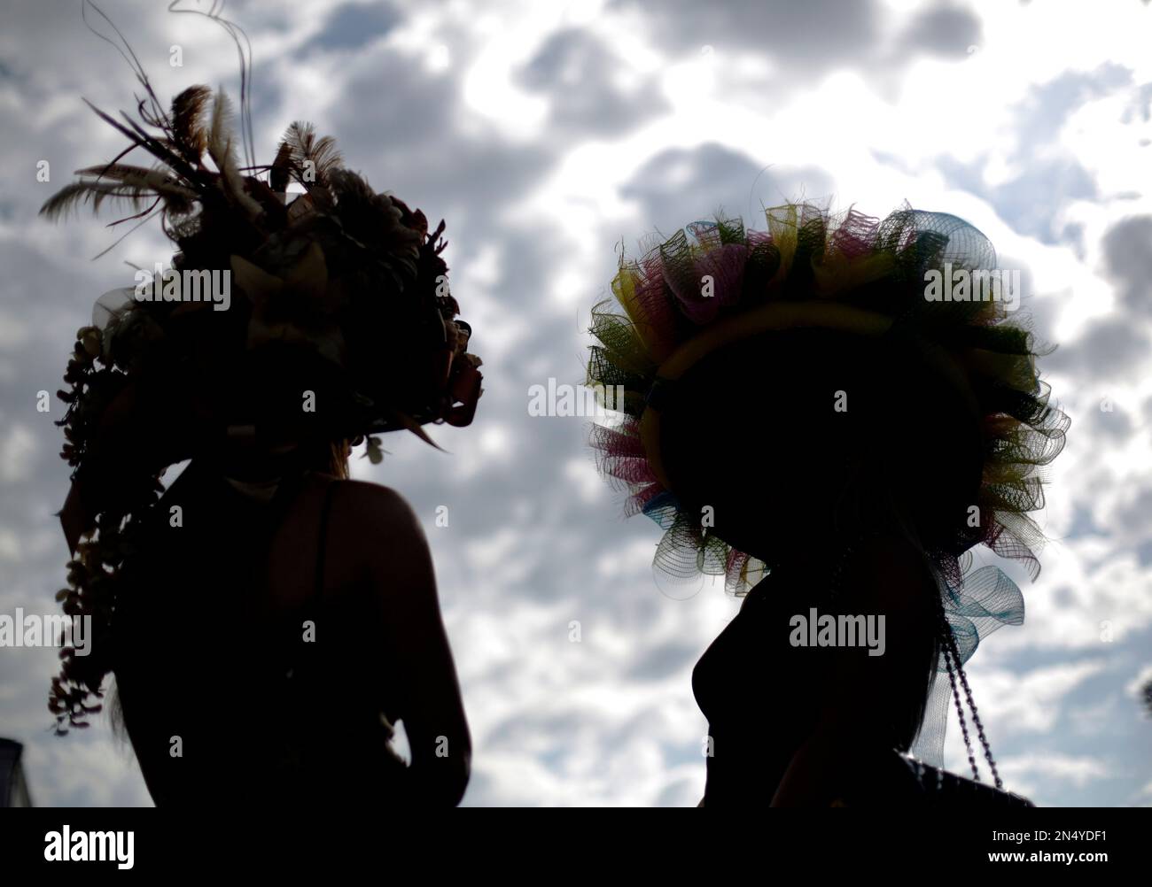 Ashley Cebak and Tami Purcell wear hats before the 140th running of the ...