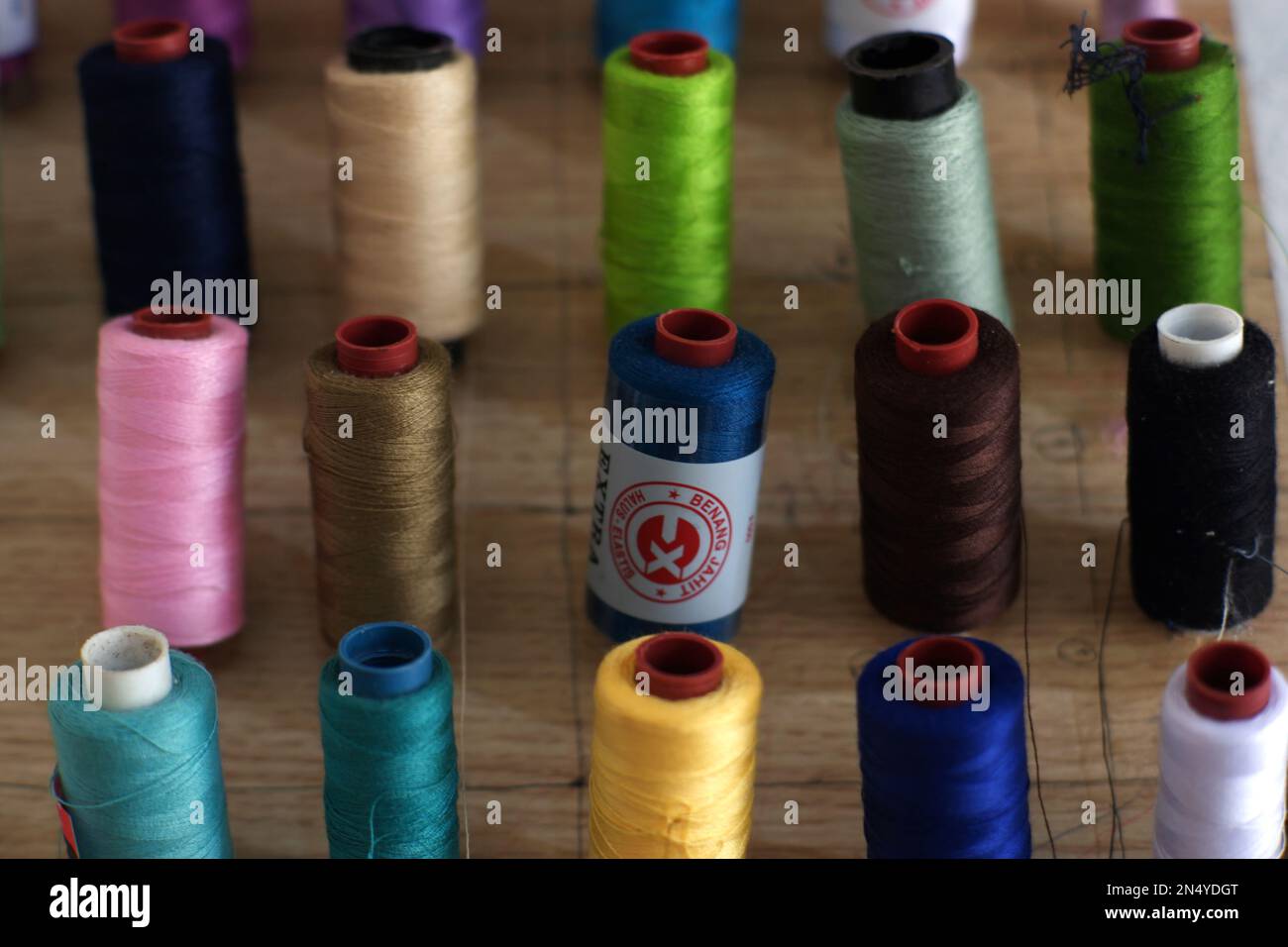 Bundles Of Thread Of Various Colors, Arranged On Wooden Wall Boards ...