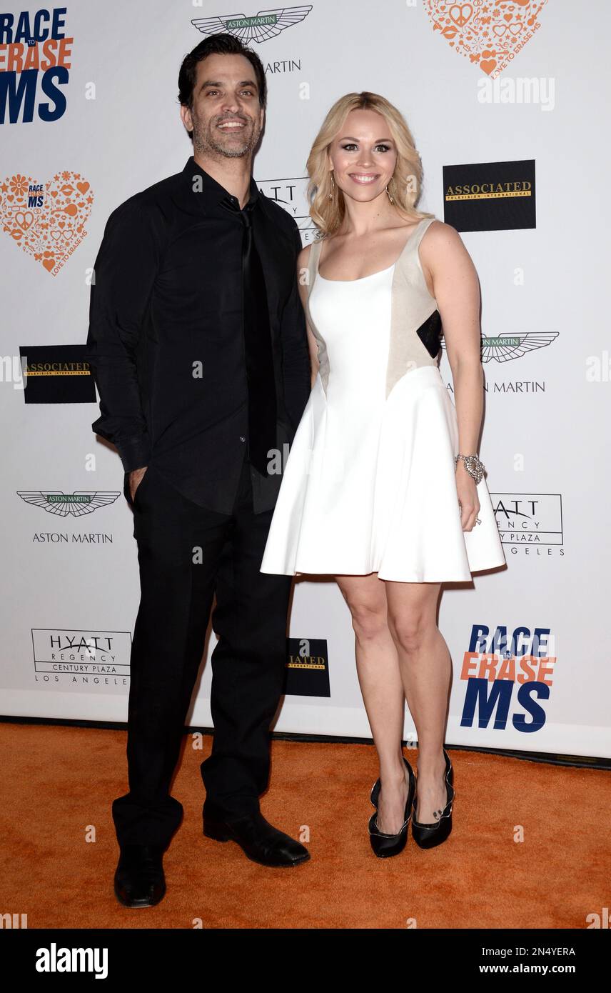 Johnathon Schaech, left, and Julie Solomon arrive at the 21st Annual ...