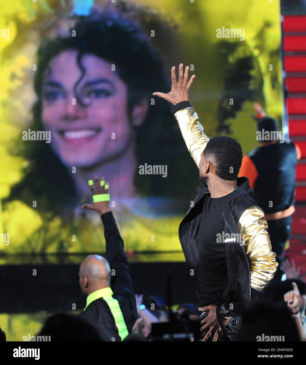 Usher performs during the world premiere of Michael Jackson's song ...