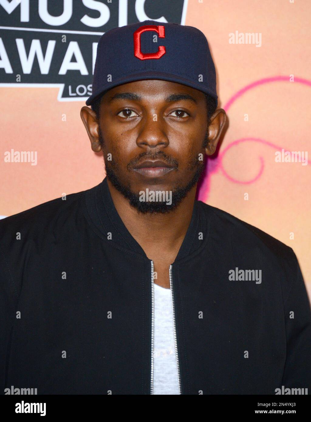 Kendrick Lamar poses in the press room at the iHeartRadio Music Awards ...