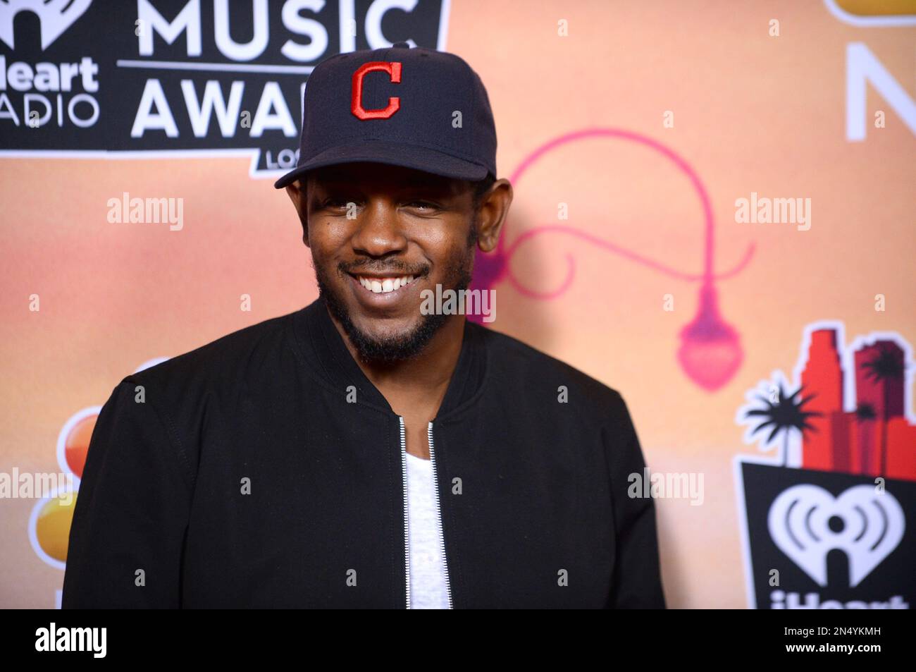 Kendrick Lamar poses in the press room at the iHeartRadio Music Awards ...