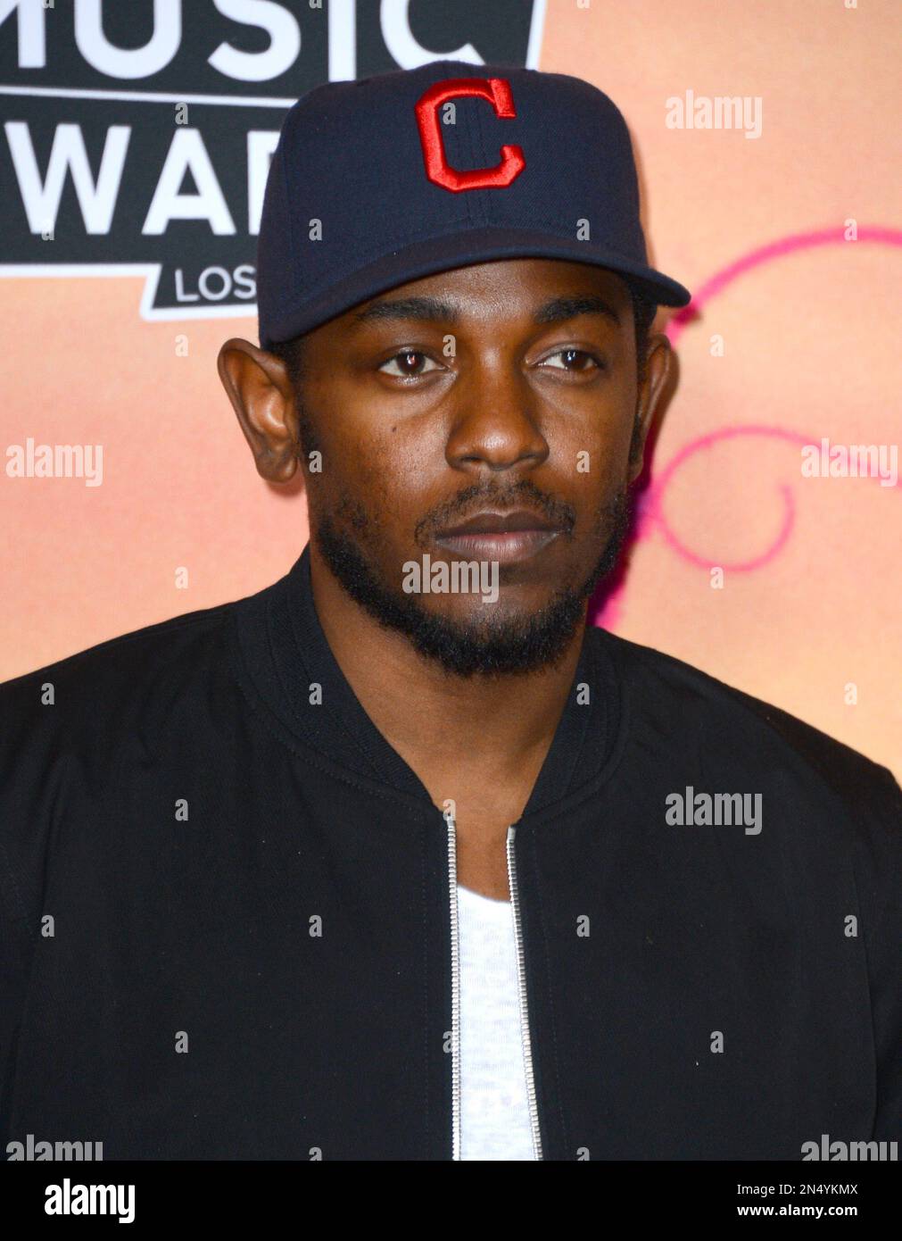 Kendrick Lamar poses in the press room at the iHeartRadio Music Awards ...