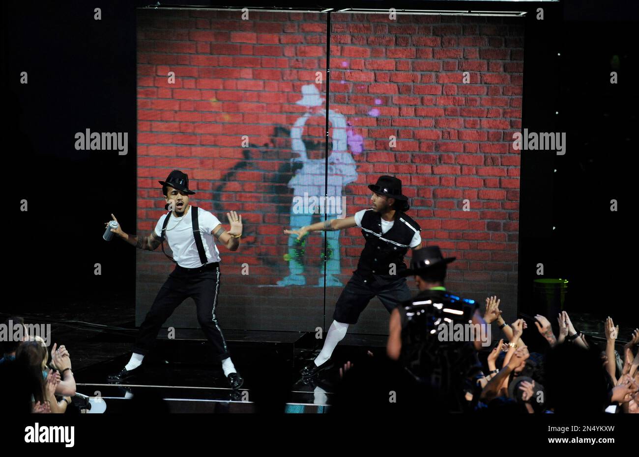 Dancers perform during the world premiere of Michael Jackson's song ...