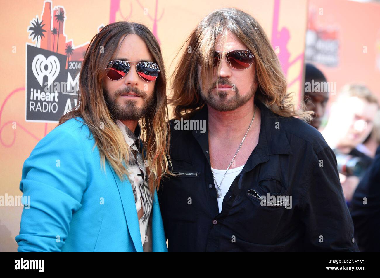 Jared Leto, left, and Billy Ray Cyrus arrive at the iHeartRadio Music ...