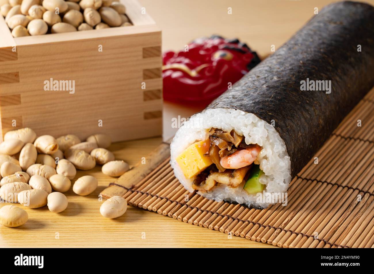 Eho-maki rolls, beans for mame-maki (bean-throwing), and demon masks on ...
