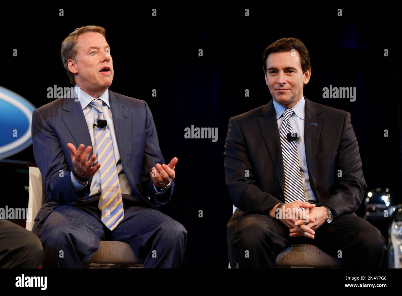 Ford Motor Company Executive Chairman Bill Ford Jr., left, talks as Chief Operating Officer Mark ...
