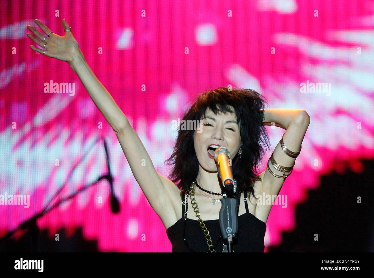 Hong Kong actress Maggie Cheung sings during a music festival in ...