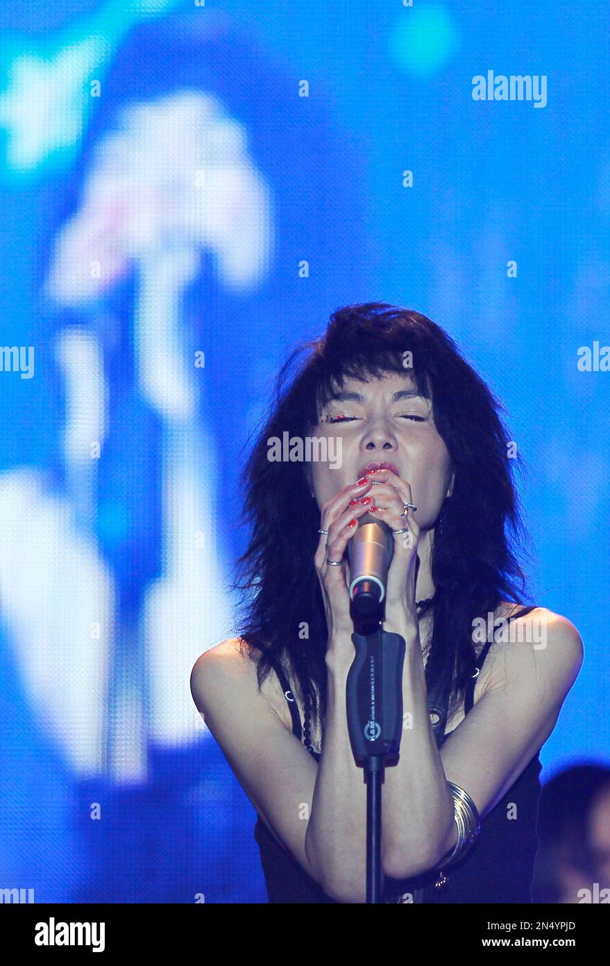 Hong Kong actress Maggie Cheung sings during a music festival in ...