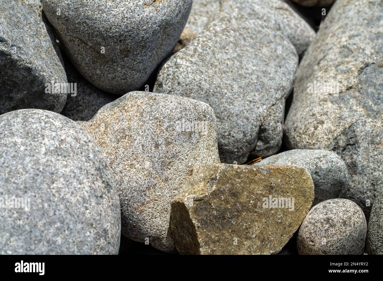 round rocks and pebbles on the beach in australia Stock Photo - Alamy