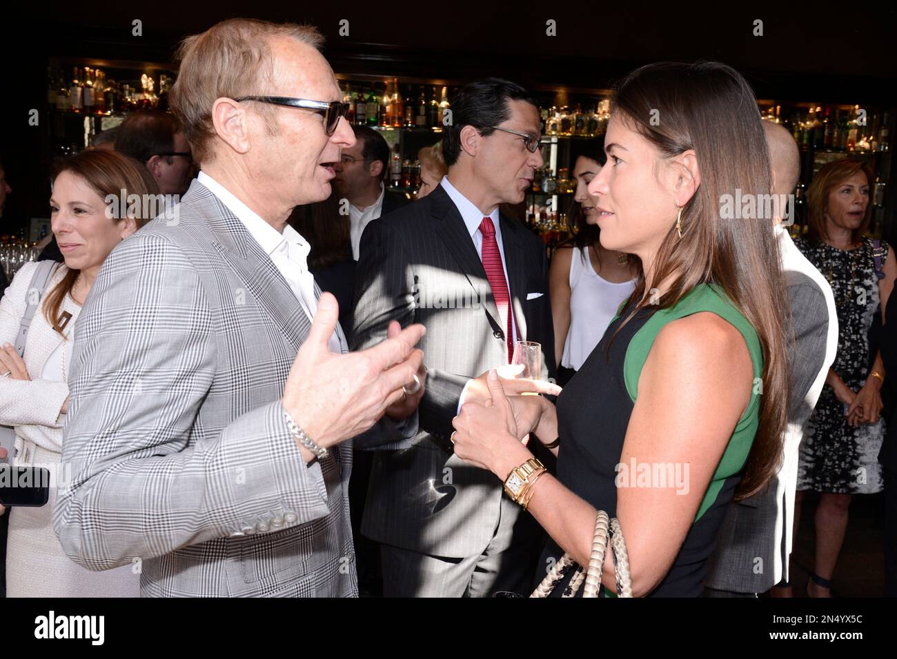 John Diemer, left, and guest attend the Power Lawyers Breakfast for The ...