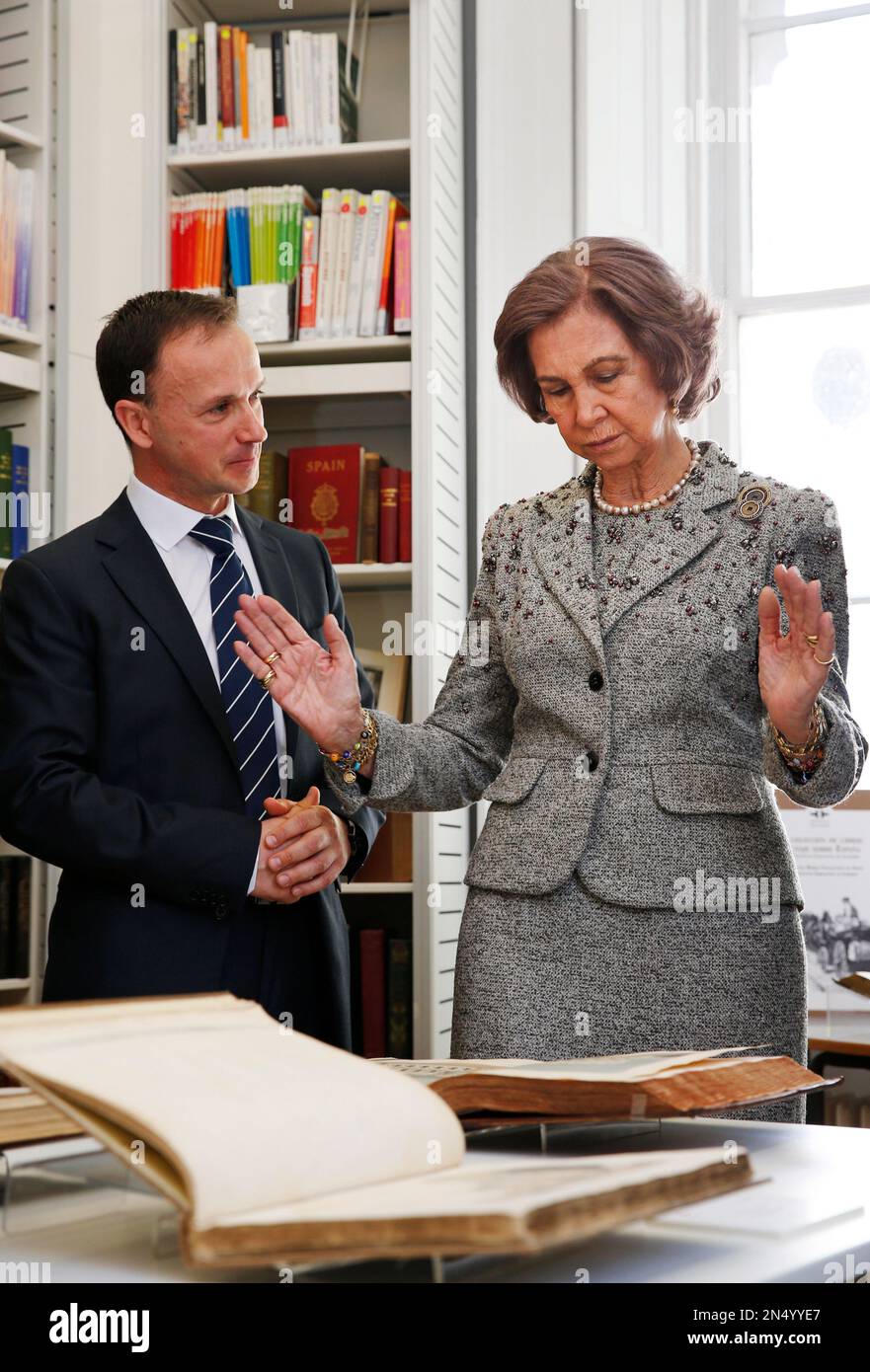 Queen Sofia of Spain is shown travel books on Spain written between ...