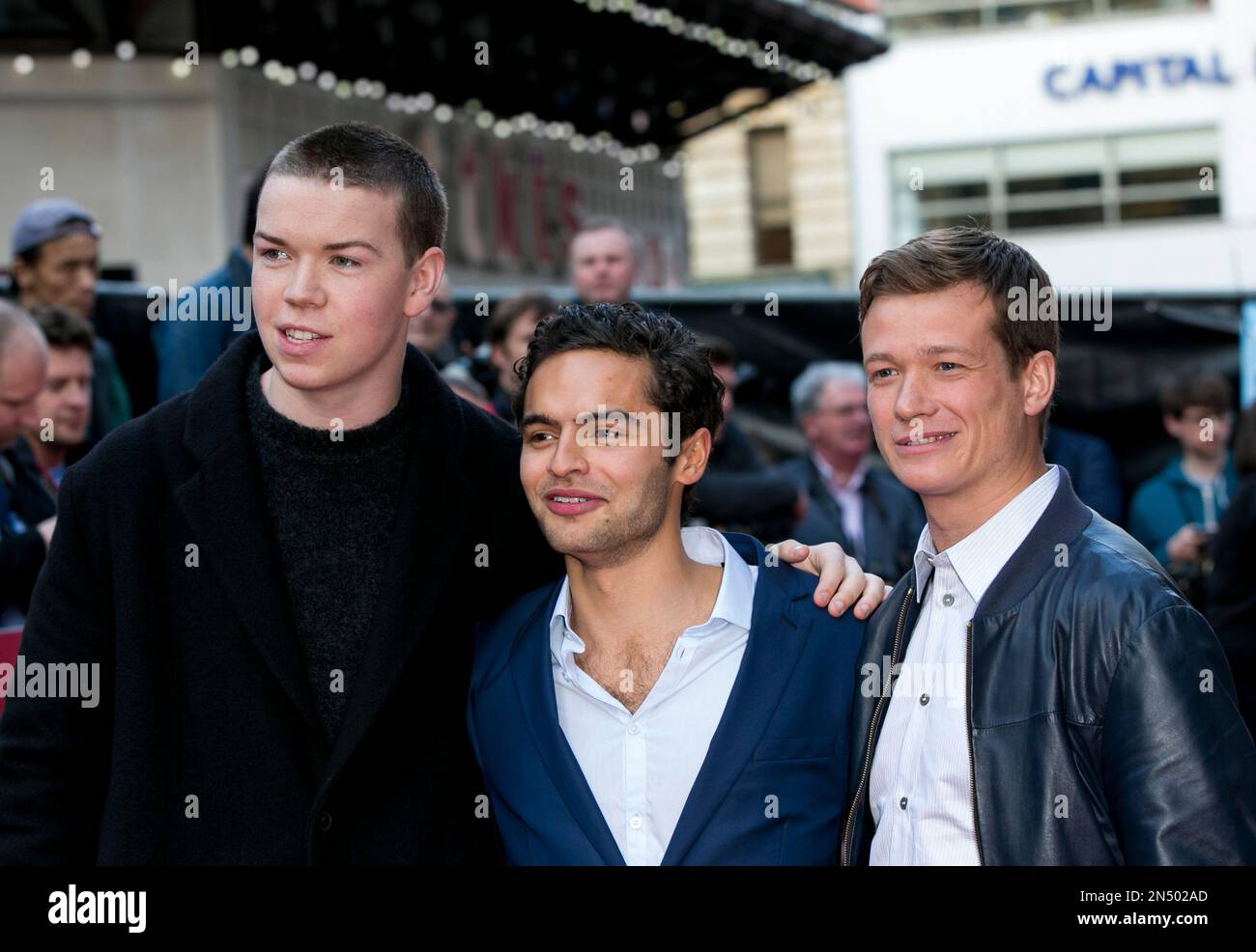 English actors Will Poulter, Sebastian de Souza and Ed Speleers pose ...