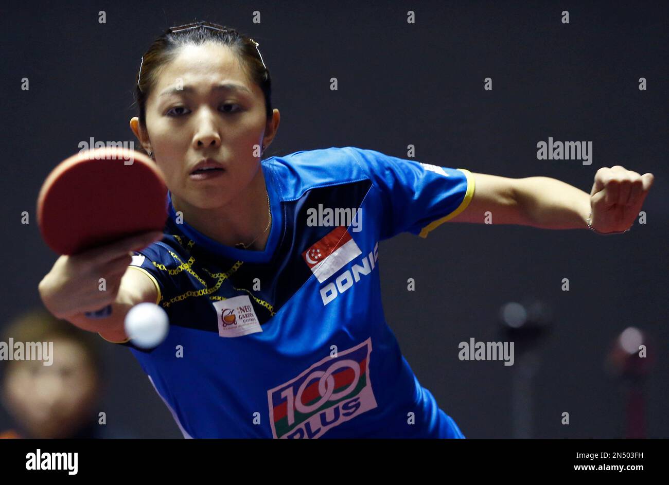 Yu Mengyu of Singapore returns a shot to Jiao Li of Nethelands during ...