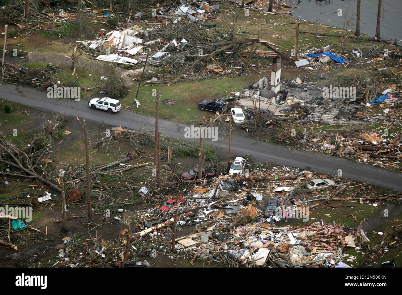 A Highway Police car patrols a neighborhood in Mayflower, Ark., Monday ...