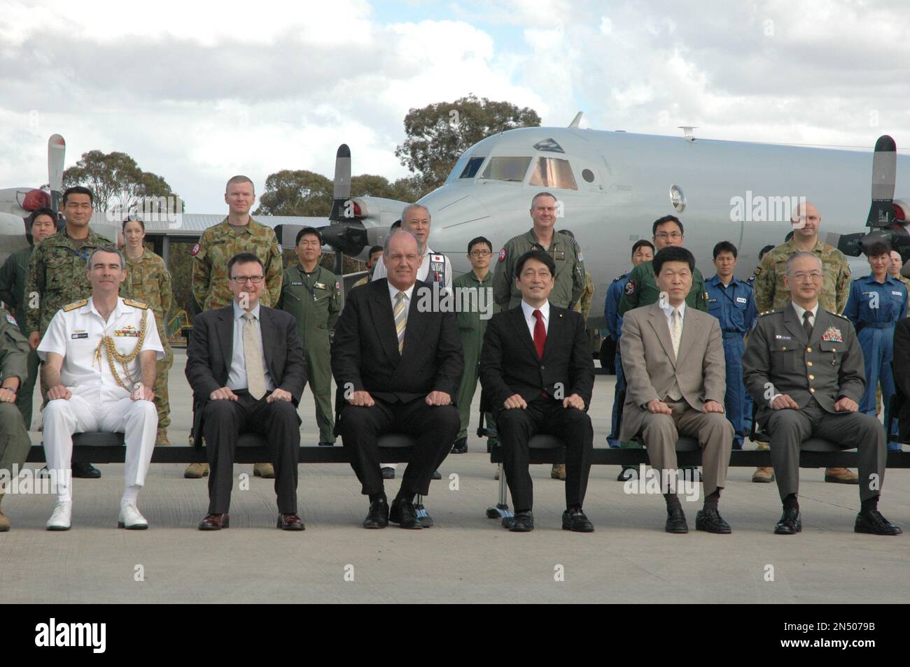 From left, Royal Australian Navy Rear Adm. Greg Sammut, Chris Birrer ...