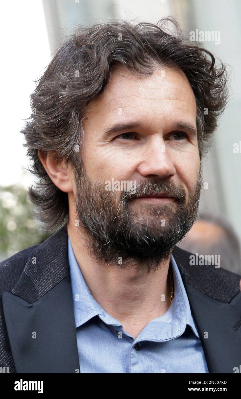 Italian chef Carlo Cracco watches at the Milan Design Fair, in Milan ...