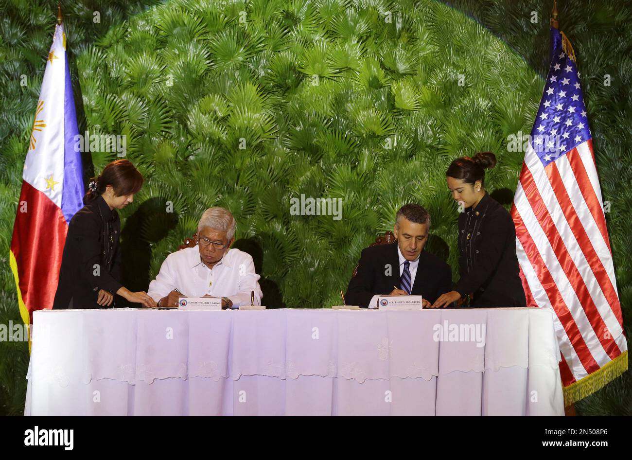 Philippine Defense Secretary Voltaire Gazmin, left, and U.S. Ambassador ...