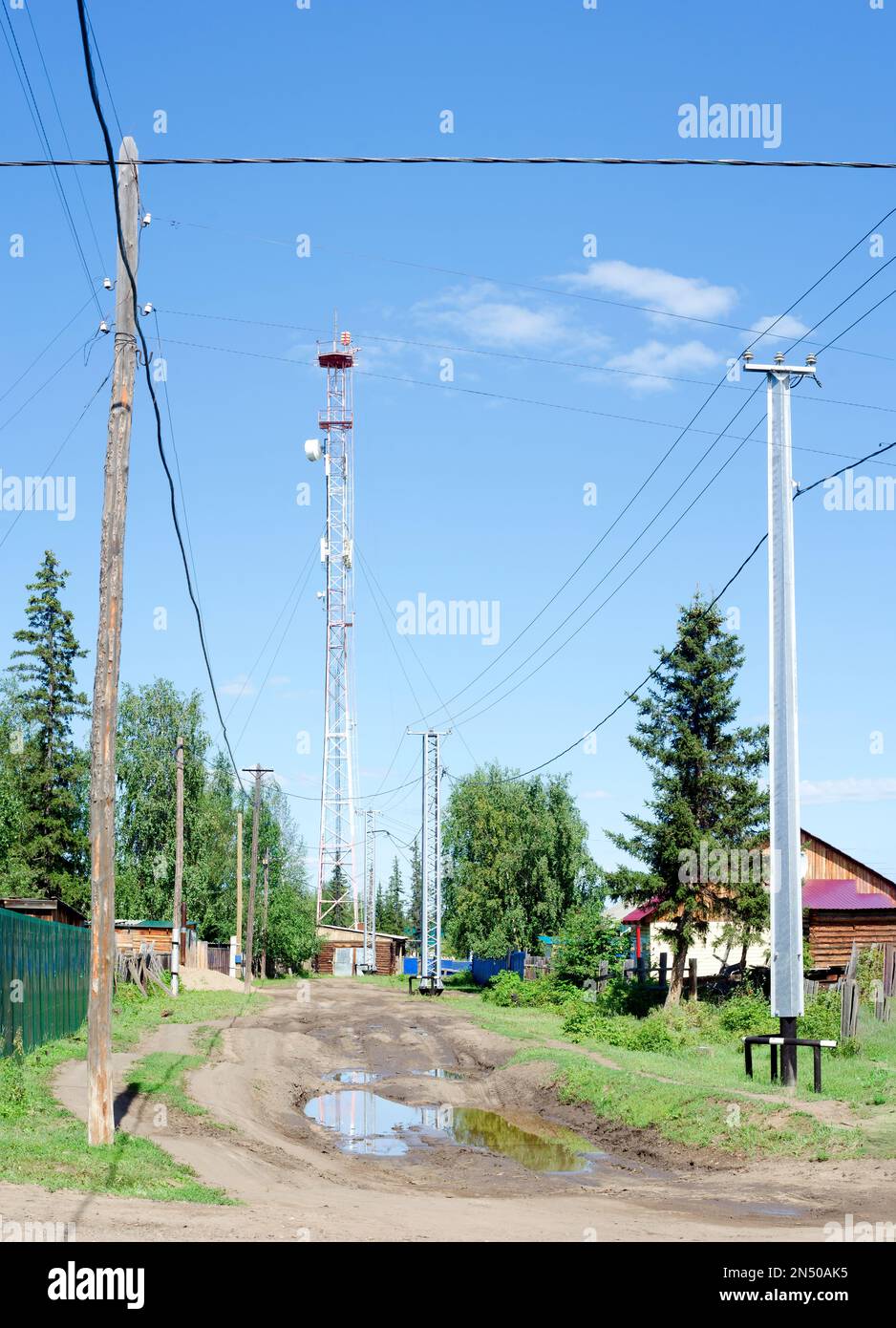 Power lines on concrete poles protected from impact by a car from below ...