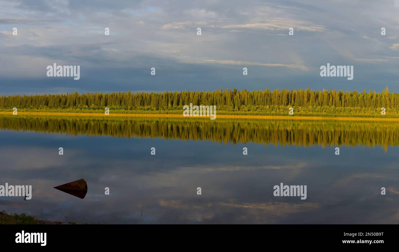 The remains of iron protrude from the surface of the water with the ...