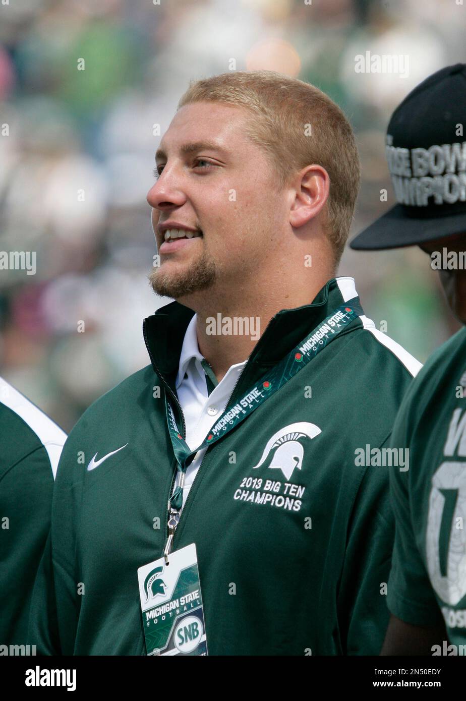 Former Michigan State player Max Bullough attends a halftime ceremony ...