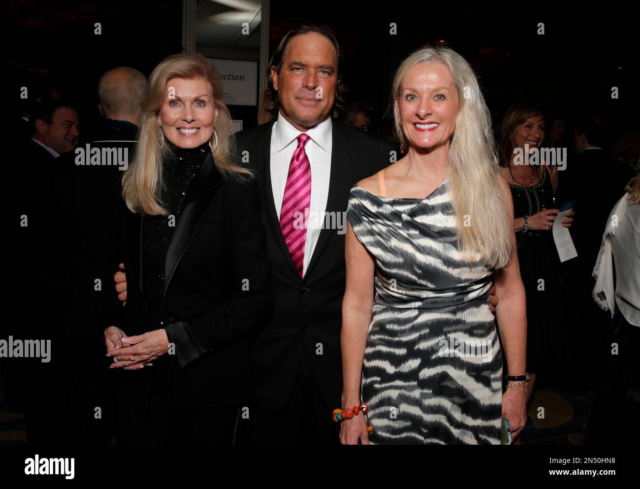 Steve Mosko, center, and guests attend the 19th annual "Taste For A ...
