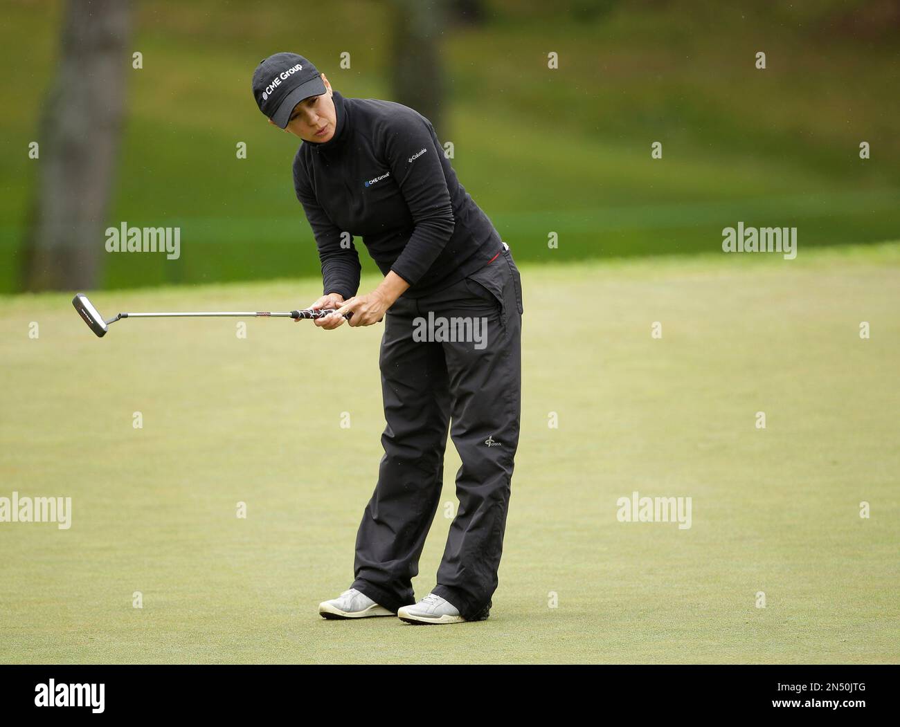 Mo Martin reacts after missing a birdie putt on the fourth green of the ...