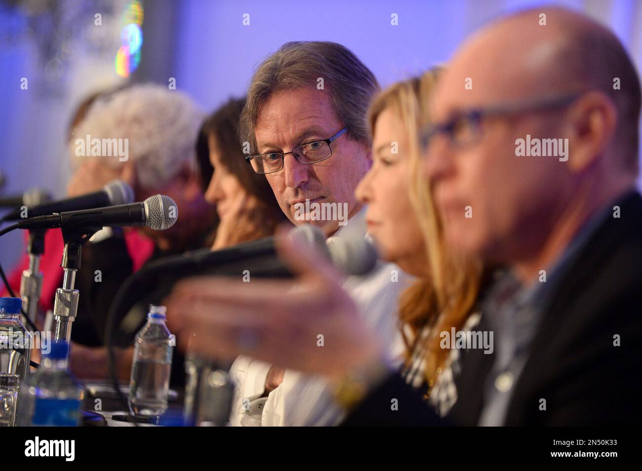 Ted Mundorff, center, of Landmark Theatres speaks at the 2014 ...