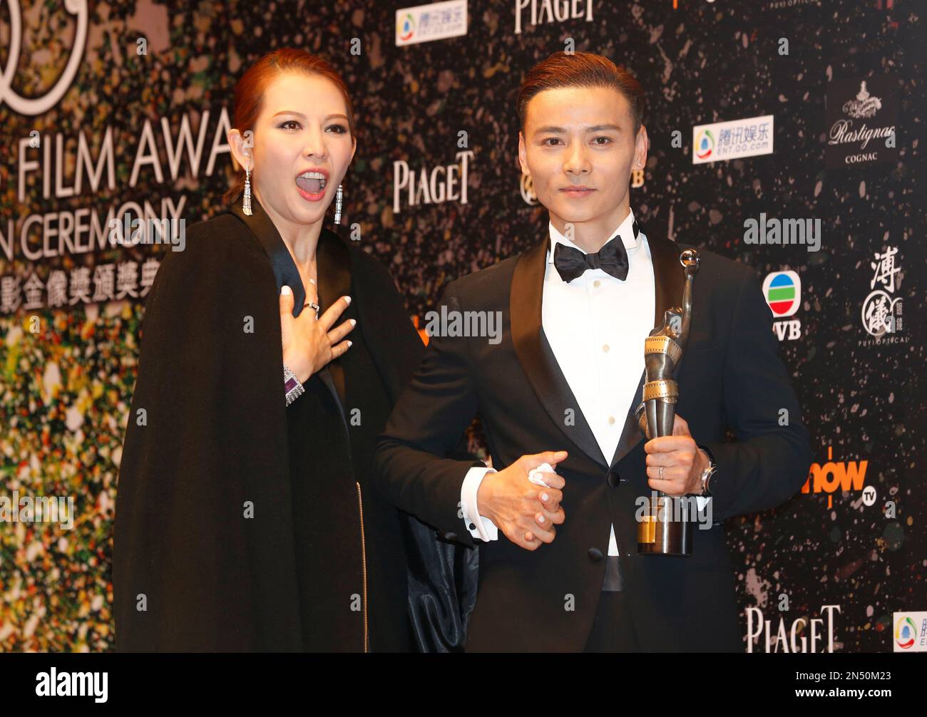 Chinese actor Zhang Jin, right and his wife Hong Kong actress Ada Choi ...