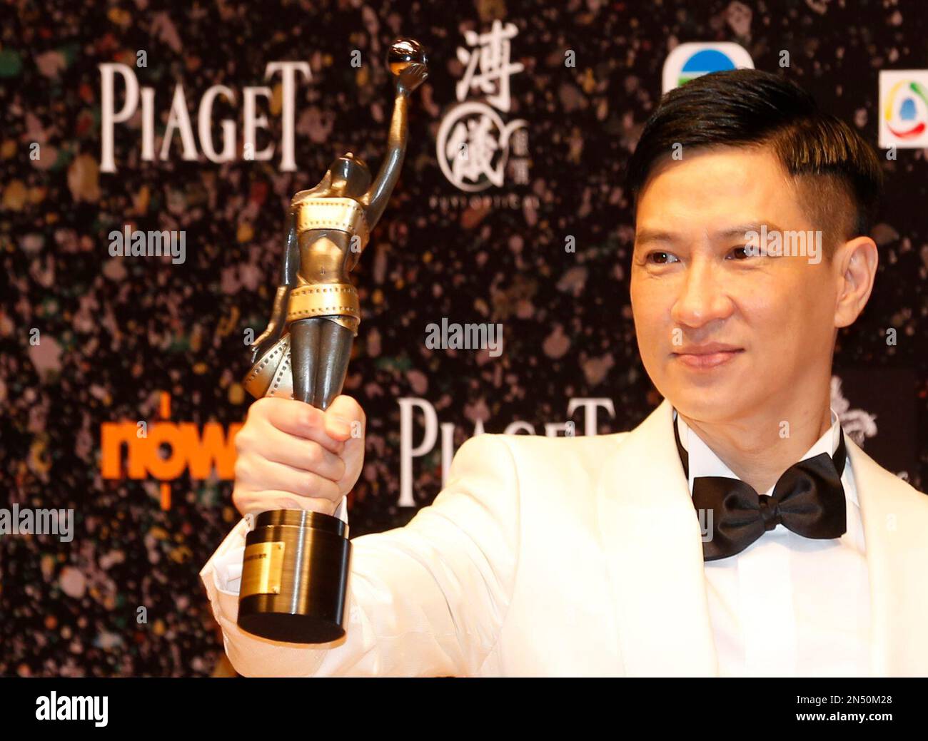 Hong Kong actor Nick Cheung Ka-fai poses after winning the Best Actor ...