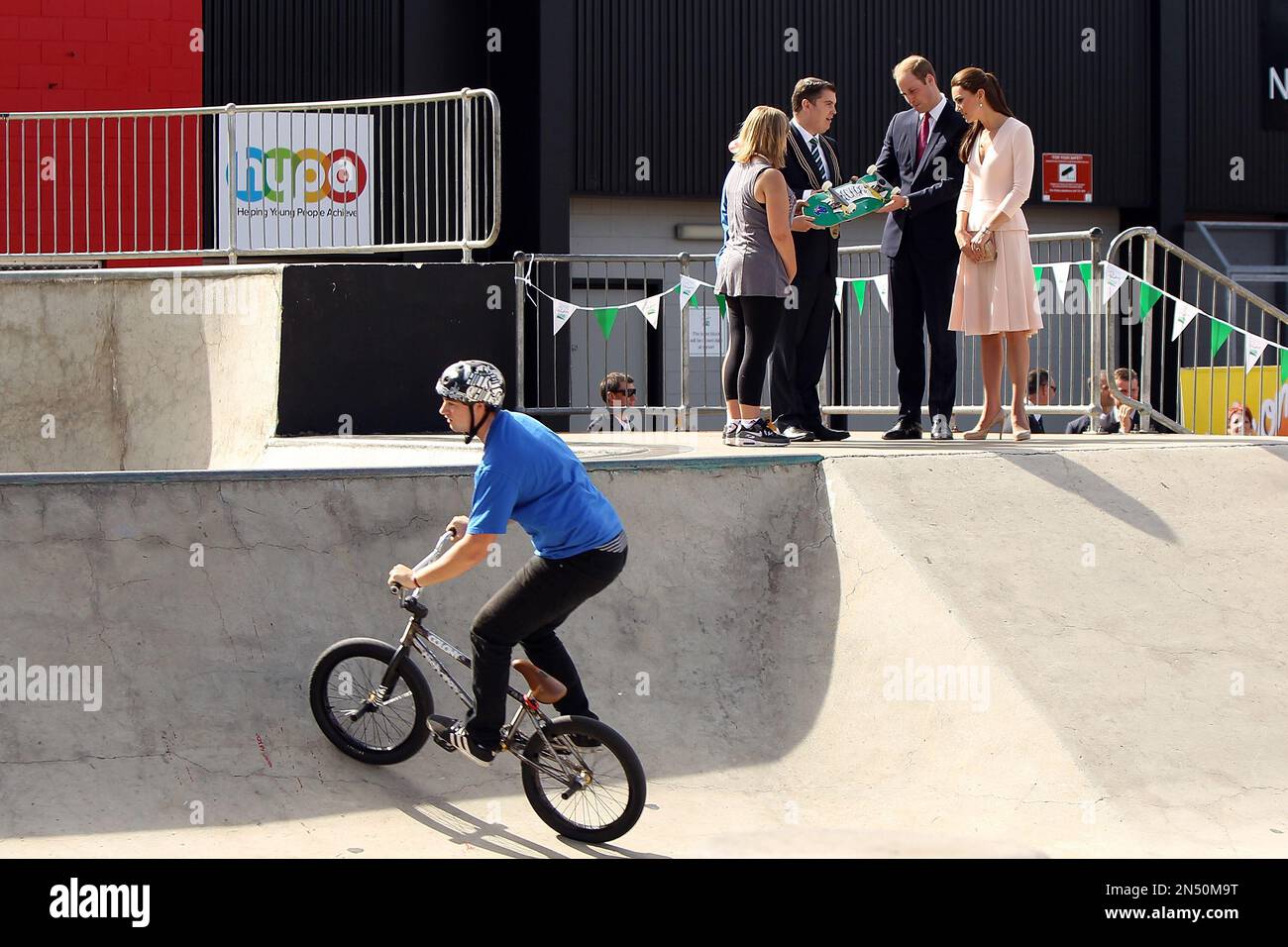 Britain's Prince William, top second right, and his wife Kate, Duchess ...