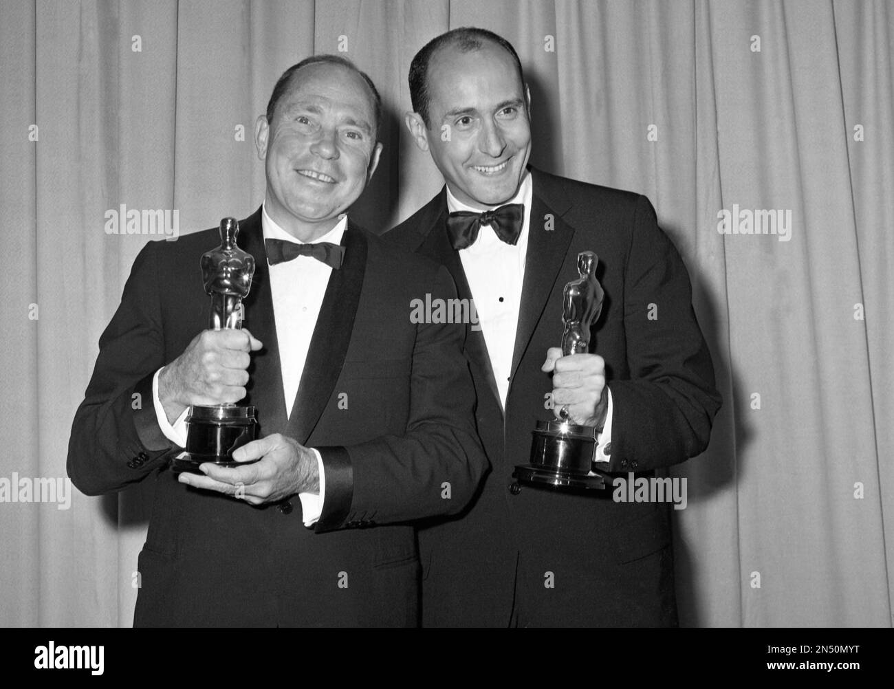 Composers Johnny Mercer, left, and Henry Mancini pose with their Oscars ...