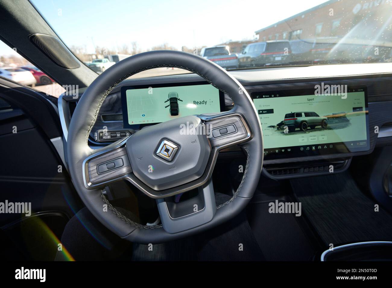 The interior of a 2023 R1S sports-utility vehicle is shown at a Rivian ...
